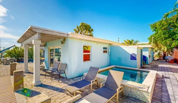 Canal-front home remodeled for HGTV with private swimming pool ...