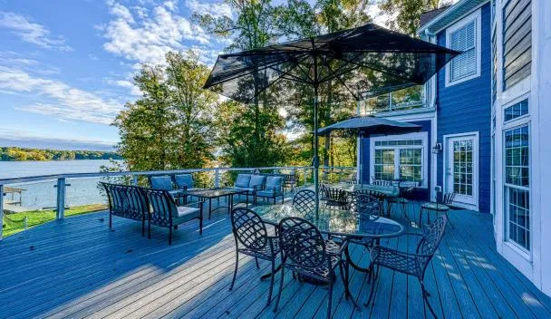 Lakefront home with private hot tub, WiFi, fun rec room, & beach area ...